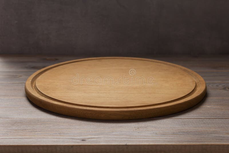Pizza Cutting Board at Rustic Wooden Table Stock Photo - Image of ...