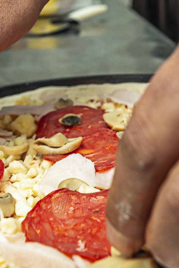 Pizza is Distinguished by Having a Thick, Spongy Base that is Baked in ...