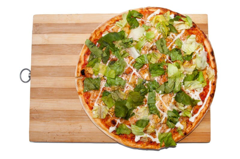 Pizza Entera Con Lechuga En Un Tablero De Madera Foto de archivo ...