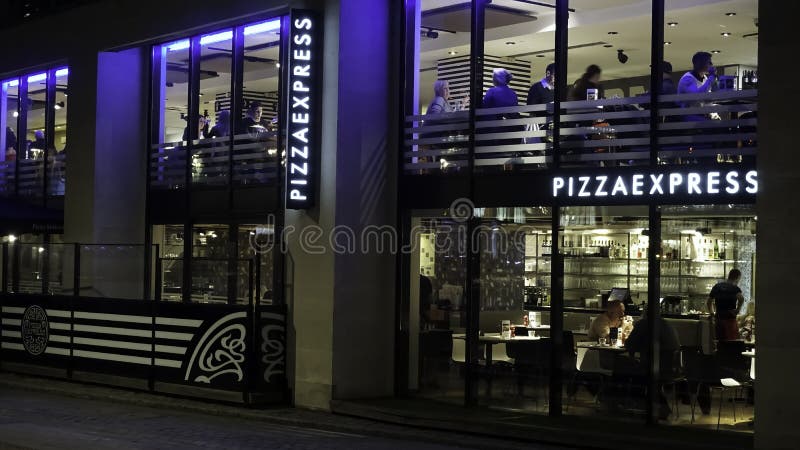Pizza Express Restaurant editorial photography. Image of signage ...