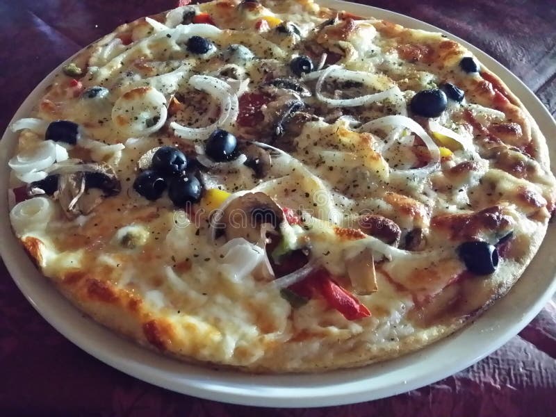 Pizza with extra toppings stock image. Image of pizza - 61930557