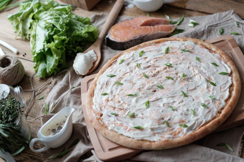 Pizza with Fish with Ingredient on the Wooden Table in Rustik Style ...