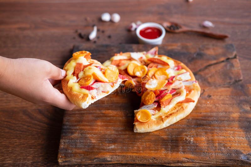 Pizza food on hand stock photo. Image of drink, meal - 192433380