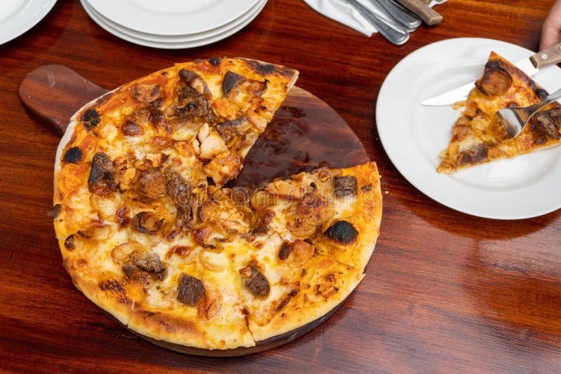 Pizza Food on Wooden Table Inside Cafe Stock Photo - Image of cooking ...