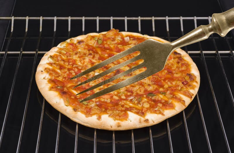 Pizza on the fork. stock photo. Image of crust, fork - 13272088