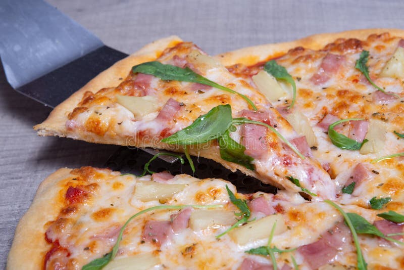 Pizza with ham and rocket stock photo. Image of arugula - 266123124