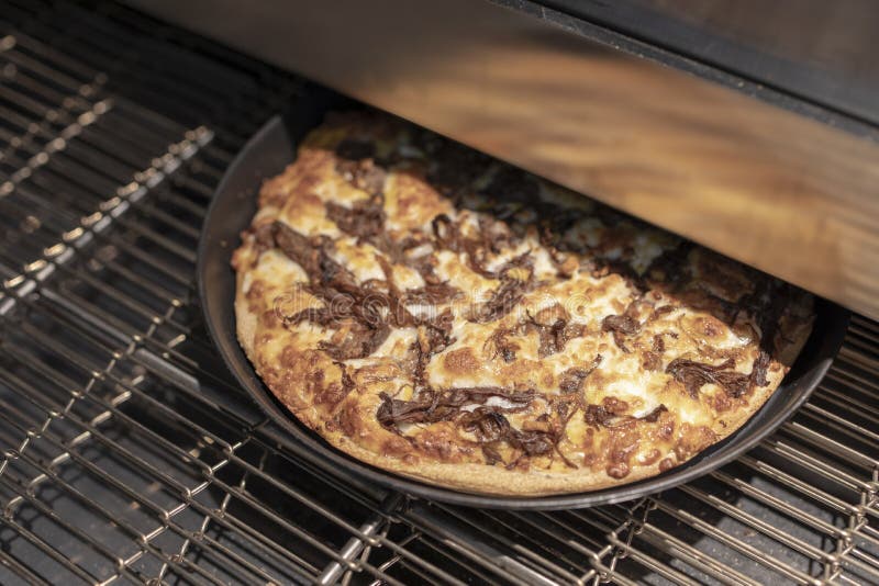 Pizza Inside the Pizza Maker Stock Photo - Image of italy, hands: 174737416