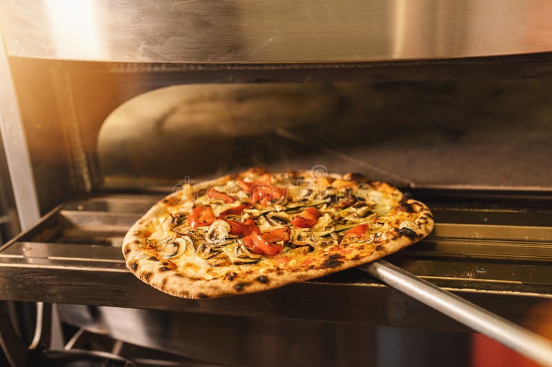 Pizza Inside an Oven in the Italian Pizzeria Stock Photo - Image of ...
