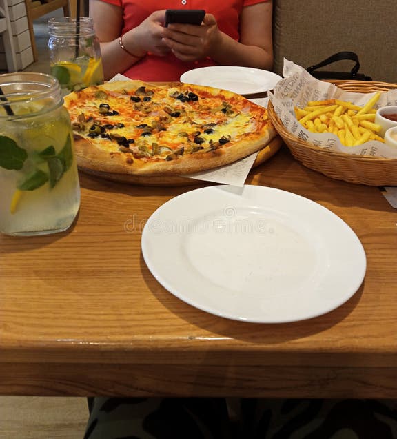 Pizza, lemonade ???? stock image. Image of dish, dinner - 331721885