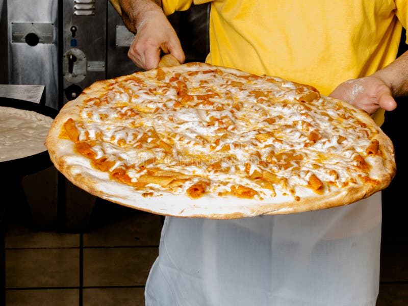 Pizza Maker Puts on the Sauce Stock Image - Image of chef, catering ...