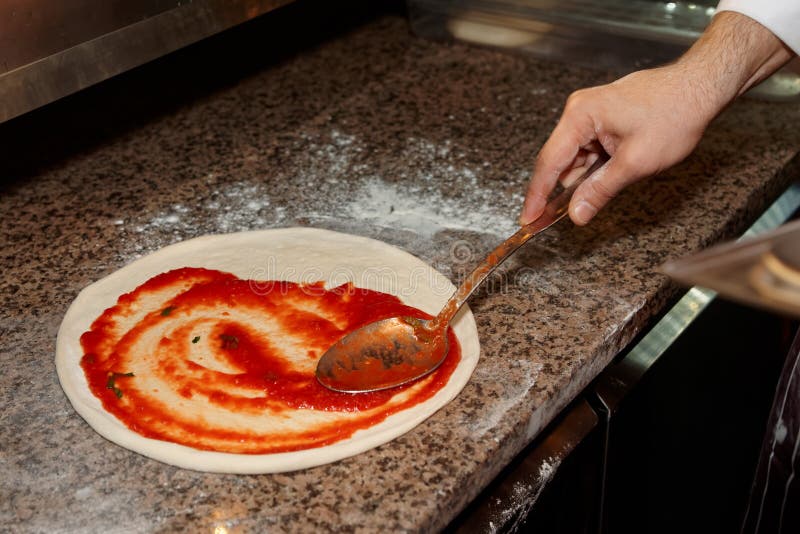 Pizza Making in a Restaurant Stock Photo - Image of sauce, commercial ...