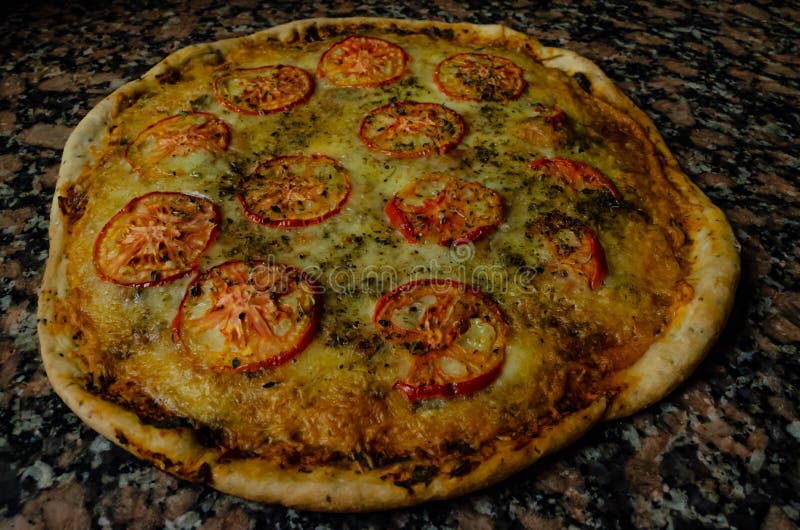 Pizza on the marble table stock image. Image of bread - 206350555