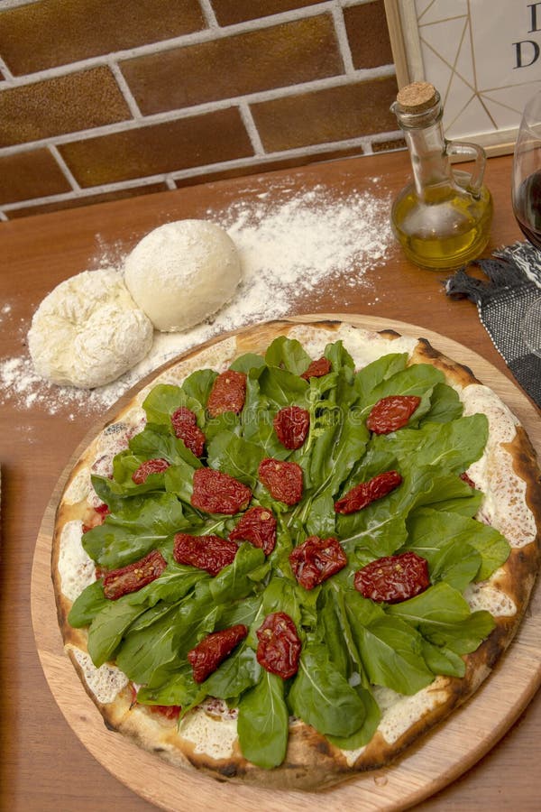 Pizza Rucula and Dried Tomato Stock Image - Image of cooked, food ...