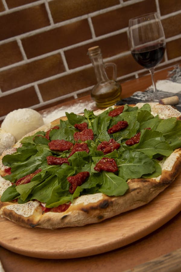 Pizza Rucula and Dried Tomato Stock Photo - Image of mediterranean ...