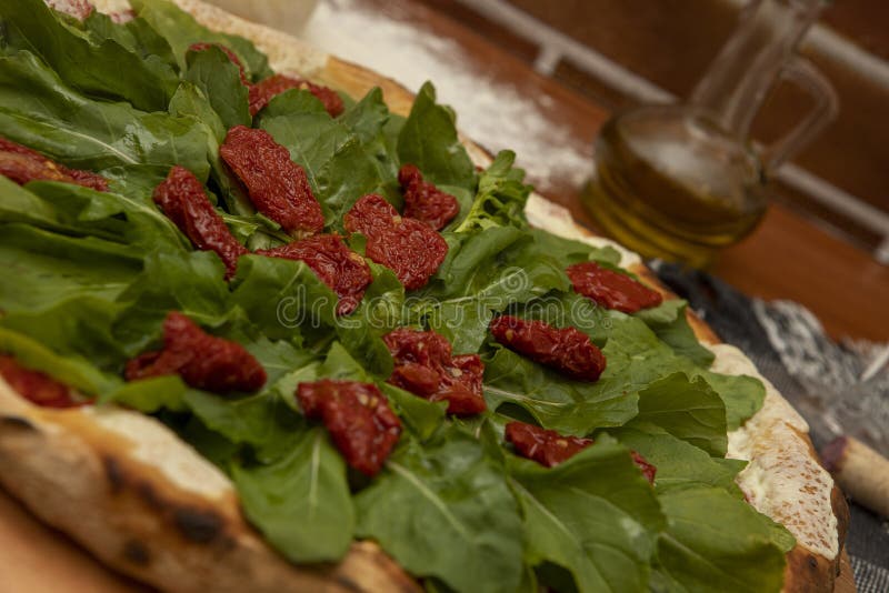 Pizza Rucula and Dried Tomato Stock Photo - Image of italian, delicious ...