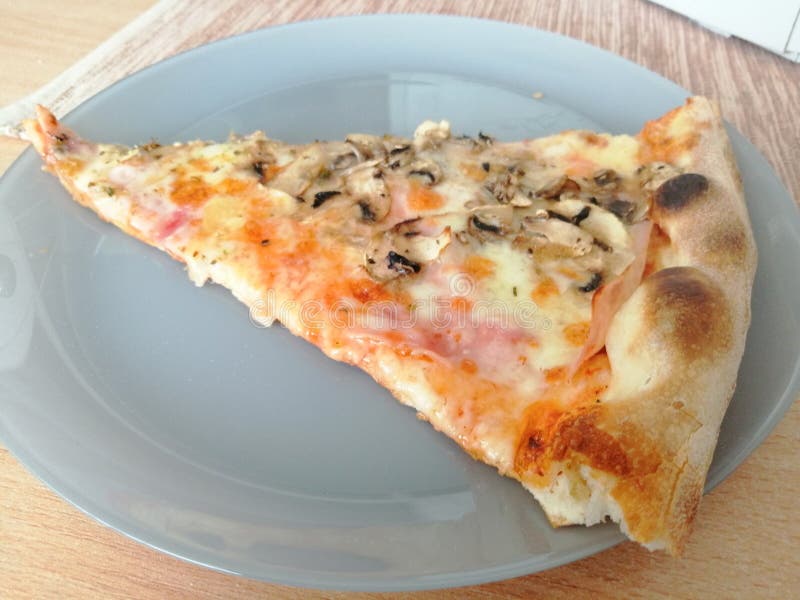 Pizza on plate stock image. Image of plate, gray, mashrooms - 145158845