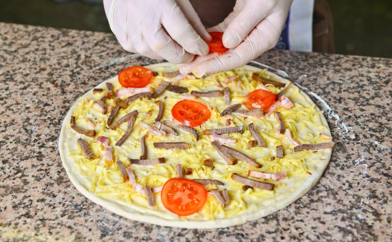 Pizza preparation stock photo. Image of making, arms - 50873180