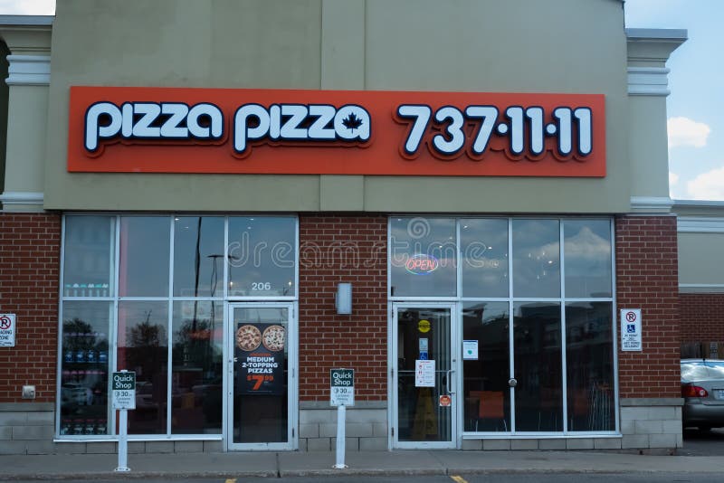 Pizza restaurant window editorial image. Image of inscription - 62321185
