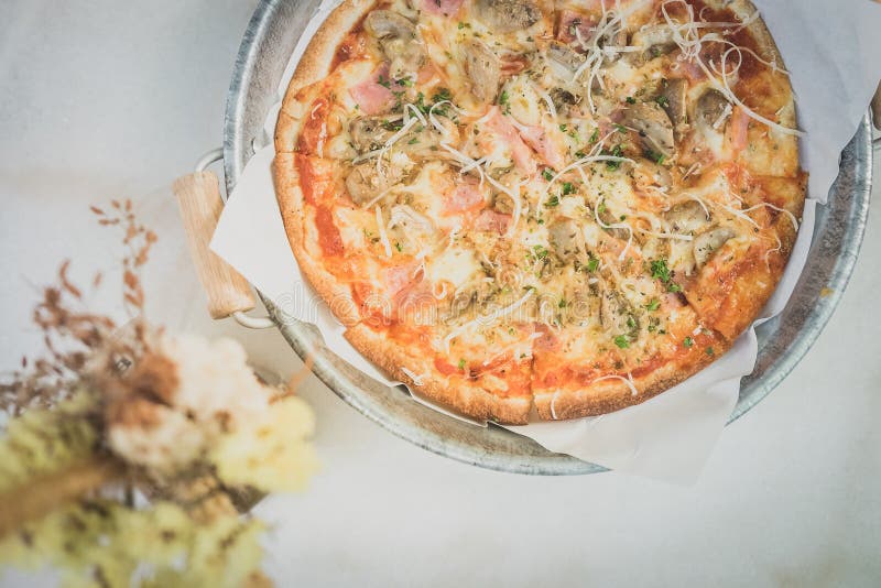Pizza Served on Marble Table Stock Photo - Image of cuts, vegetables ...