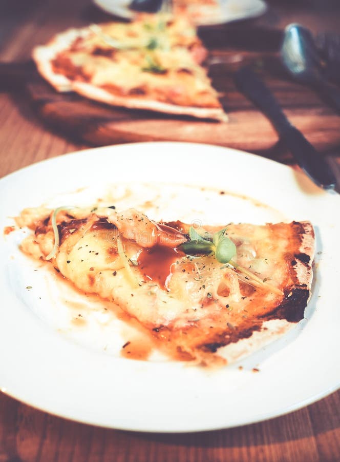 Pizza slice on dish stock photo. Image of bacon, pizza - 85888970