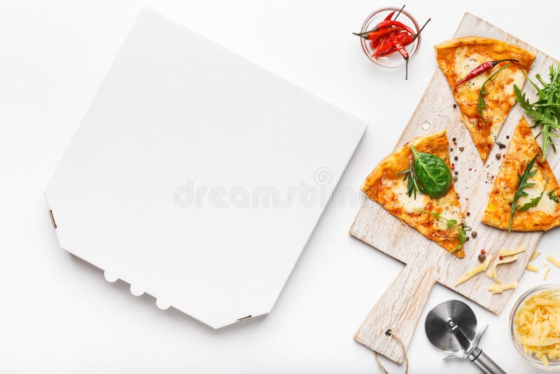 Pizza Slices on Cutting Board and Empty Cardboard Box Stock Photo ...
