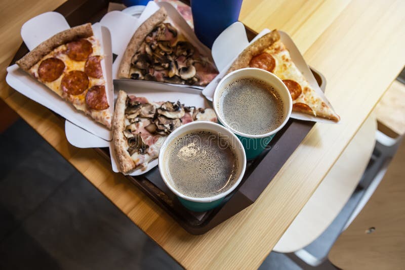 Pizza Slices with Salami and Mushrooms, Coffee, Drinks. Stock Image ...