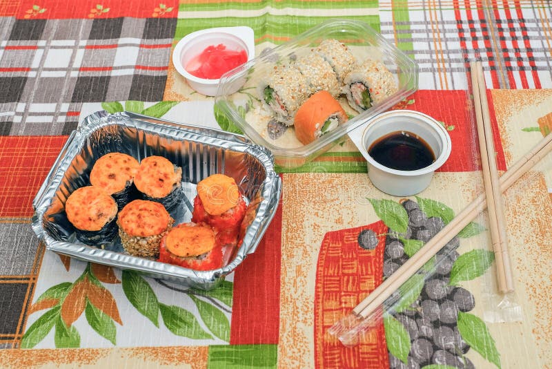 Pizza SushiThe Composition on the Cutting Board Pizza and Sushi for ...