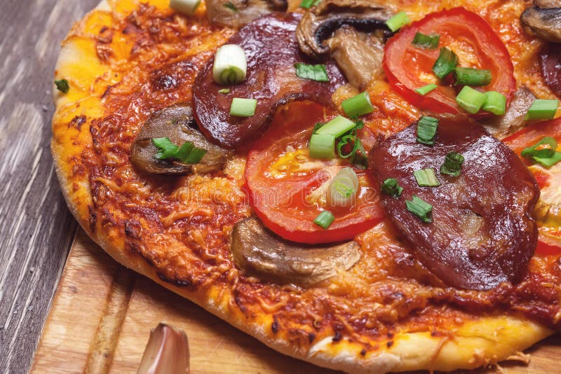 Pizza on the table stock photo. Image of cook, garlic - 189905818