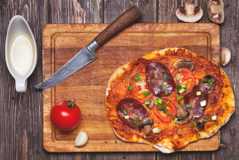 Pizza on the table stock image. Image of cook, table - 69270481