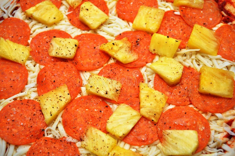 A pizza with toppings stock image. Image of square, toppings - 56691779