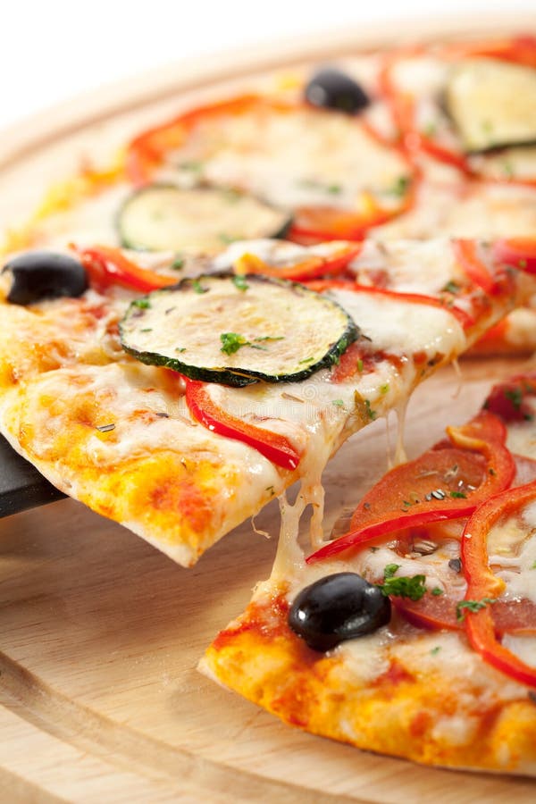 Pizza vegetariana imagen de archivo. Imagen de perejil - 86372501