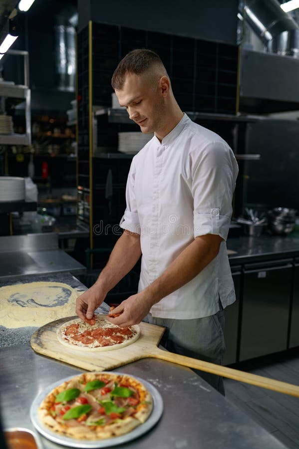 Pizzaiolo Adding Ham on Pizza Base with Cheese, Preparing Italian Dish ...