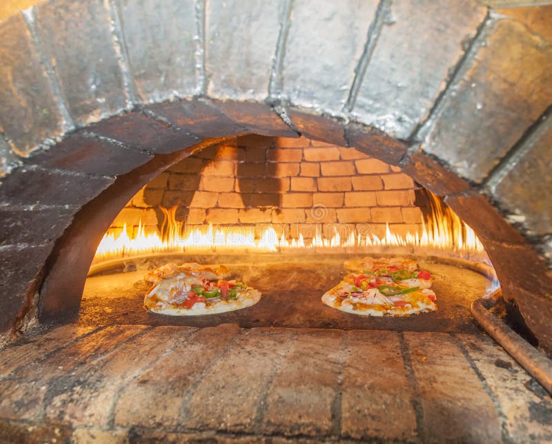 Pizzas Cooking in an Open Oven Stock Image - Image of flame, pizza ...