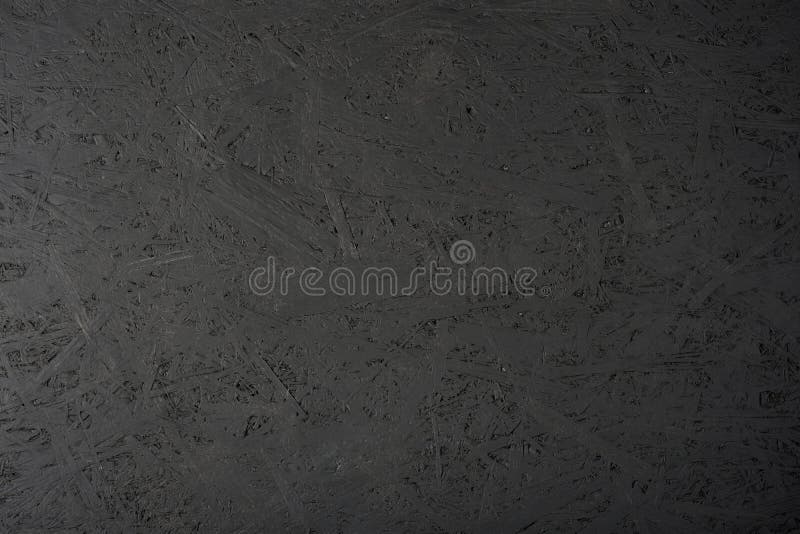 Placa pintada negra de OSB imagen de archivo. Imagen de abigarrado ...