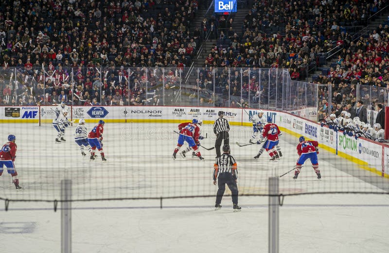 Rocket De Laval Vs. Toronto Marlies Face Off Editorial Photo - Image of ...