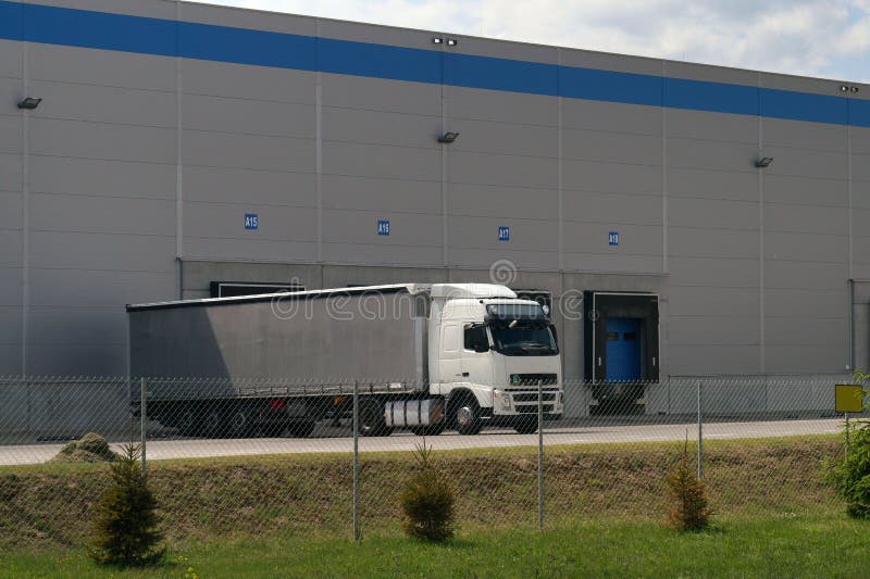 A Truck during Unloading in a Distribution Center. Place Loading and ...