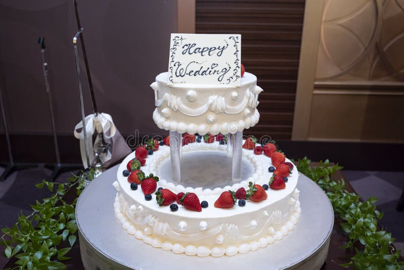 Place a Plate of the Two-tiered Wedding Cake "Happy Wedding Stock Image ...