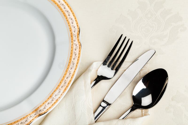 Table Setting with Plate, Fork, Knife, Spoon and Stock Photo - Image of ...