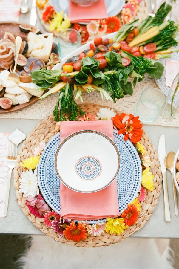 A Place Setting for a Dinner Guest at a Colorfully Decorated Table ...