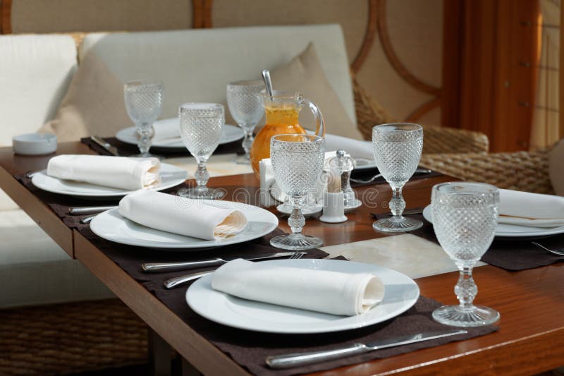 Place Setting in a Restaurant Stock Photo - Image of napkin, glass ...