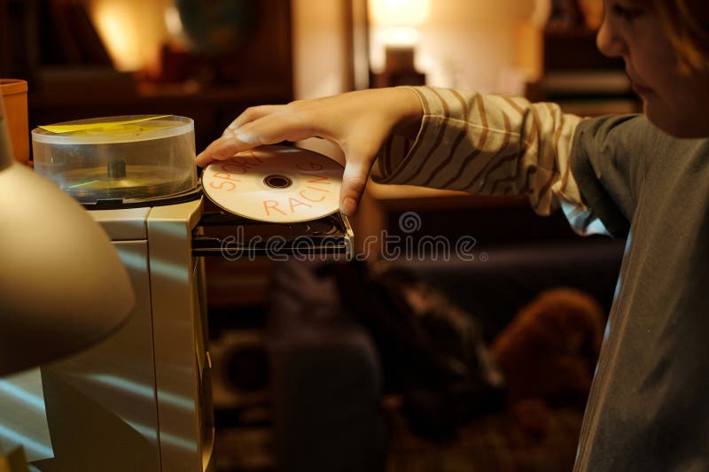 Placing CD into Player in Cozy Home Environment Stock Image - Image of ...