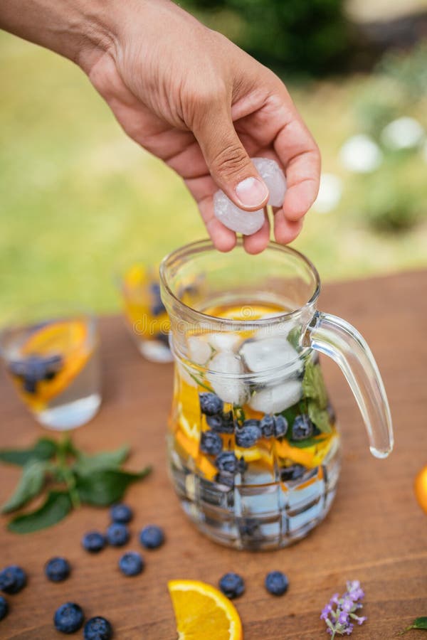 Placing Ice in the Infused Detox Water Stock Photo - Image of diet ...