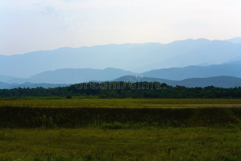 Plain Against the Background of Beautiful Blue Mountains. Stock Image ...