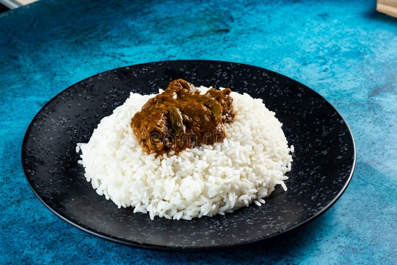 Plain Boiled Rice with Pickle in a Plate Top View on Marble Background ...