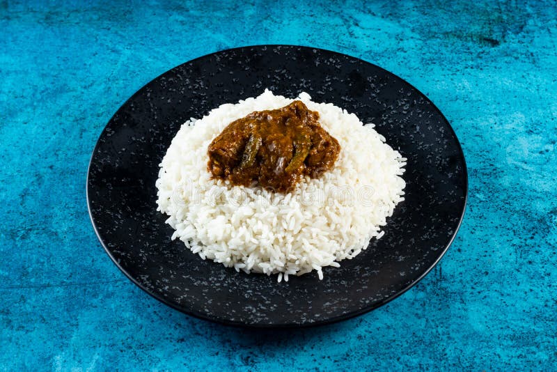 Plain Boiled Rice with Pickle in a Plate Top View on Marble Background ...