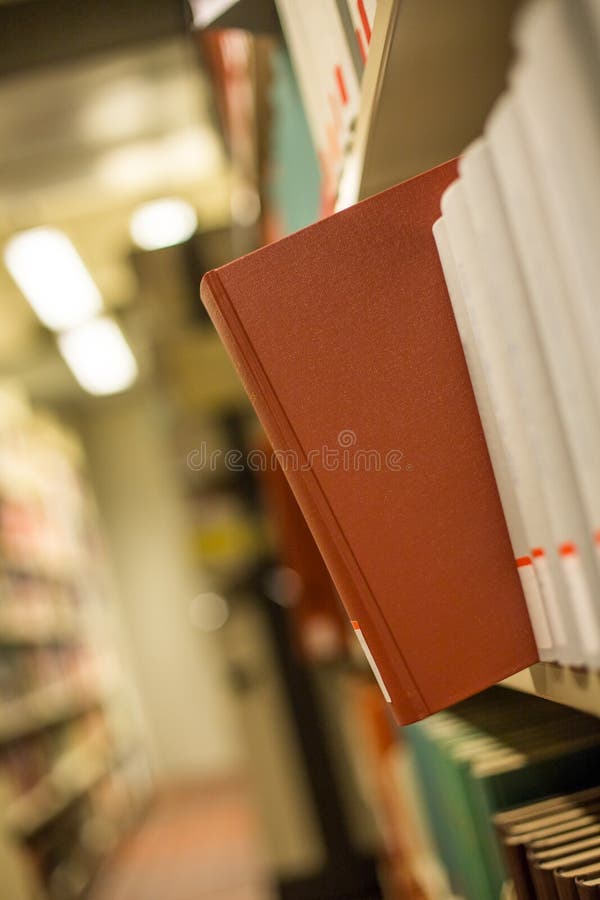 A Plain Book in a Bookshelf Stock Image - Image of book, classic: 39915065