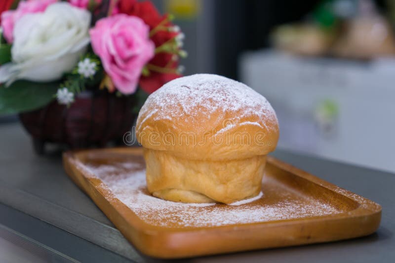 Plain Butter Bread with Icing Sugar Powder on Wooden Plate Stock Image ...
