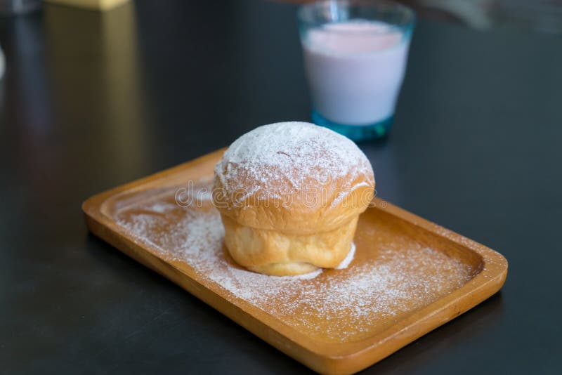 Plain Butter Bread with Icing Sugar Powder on Wooden Plate Stock Image ...