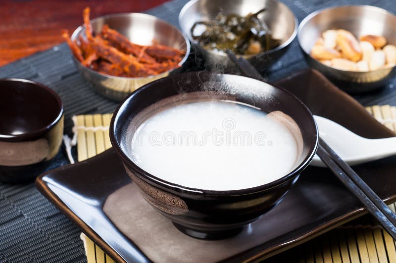 Plain Congee with Their Toppings Stock Photo - Image of bowl, food ...
