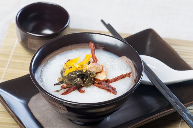 Plain Congee with Their Toppings Stock Photo - Image of bowl, food ...